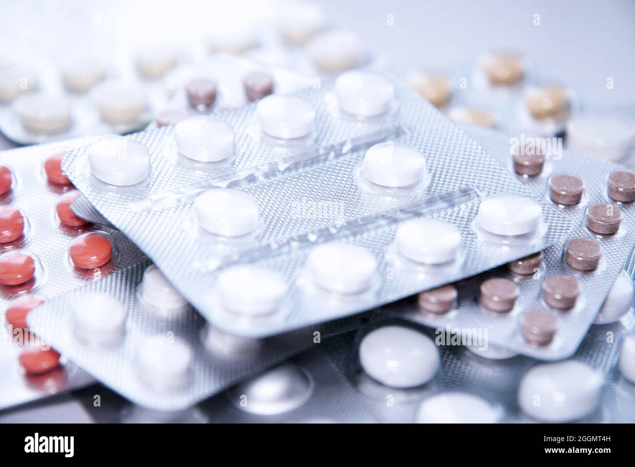 Overall view of pharmaceutical tablets and capsules in packages in ...