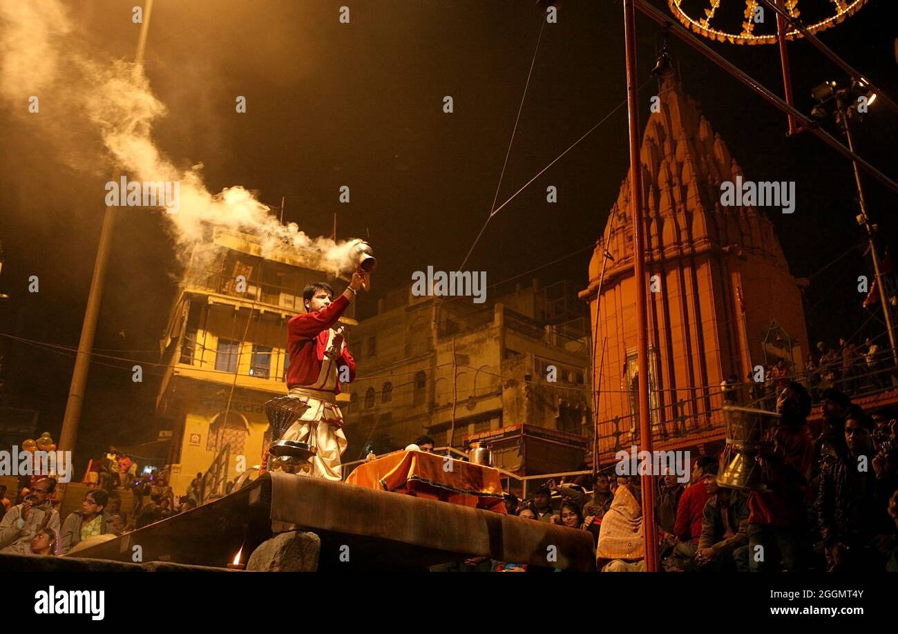 Priests perform prayer of holy river river Ganga called Ganga Arti at ...