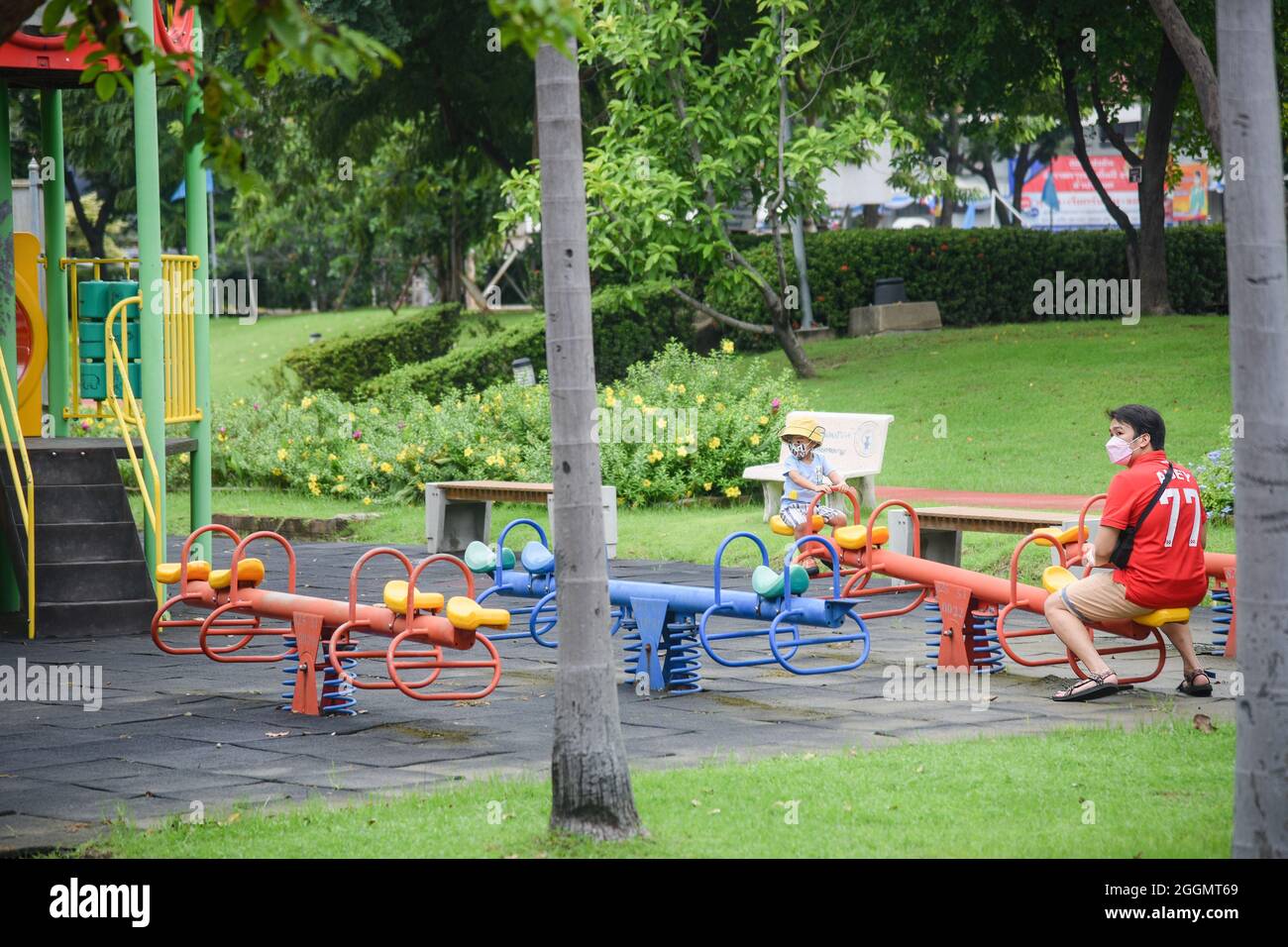 Nonthaburi, Thailand. 01st Sep, 2021. A man and a kid are seen playing ...