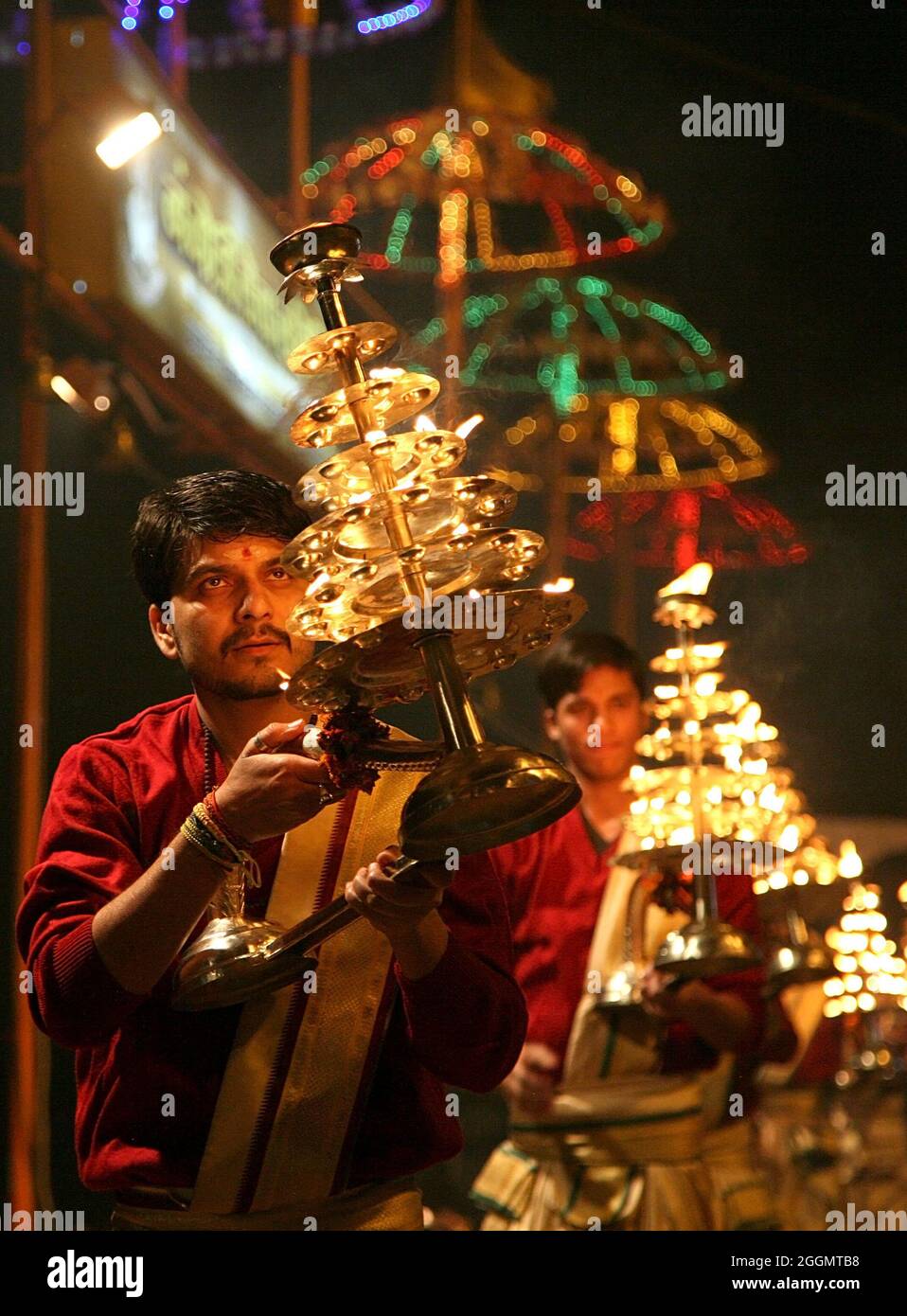 Priests perform prayer of holy river river Ganga called Ganga Arti at ...