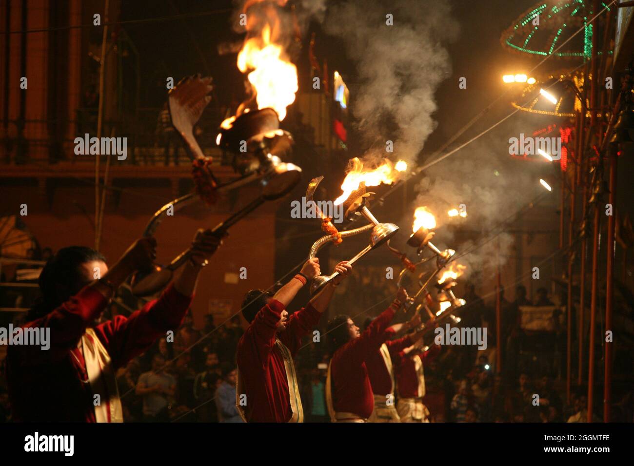 Priests perform prayer of holy river river Ganga called Ganga Arti at ...