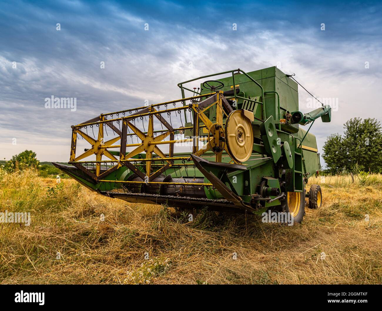 Old green combine harvester agricultural machine. Agricultural concept ...