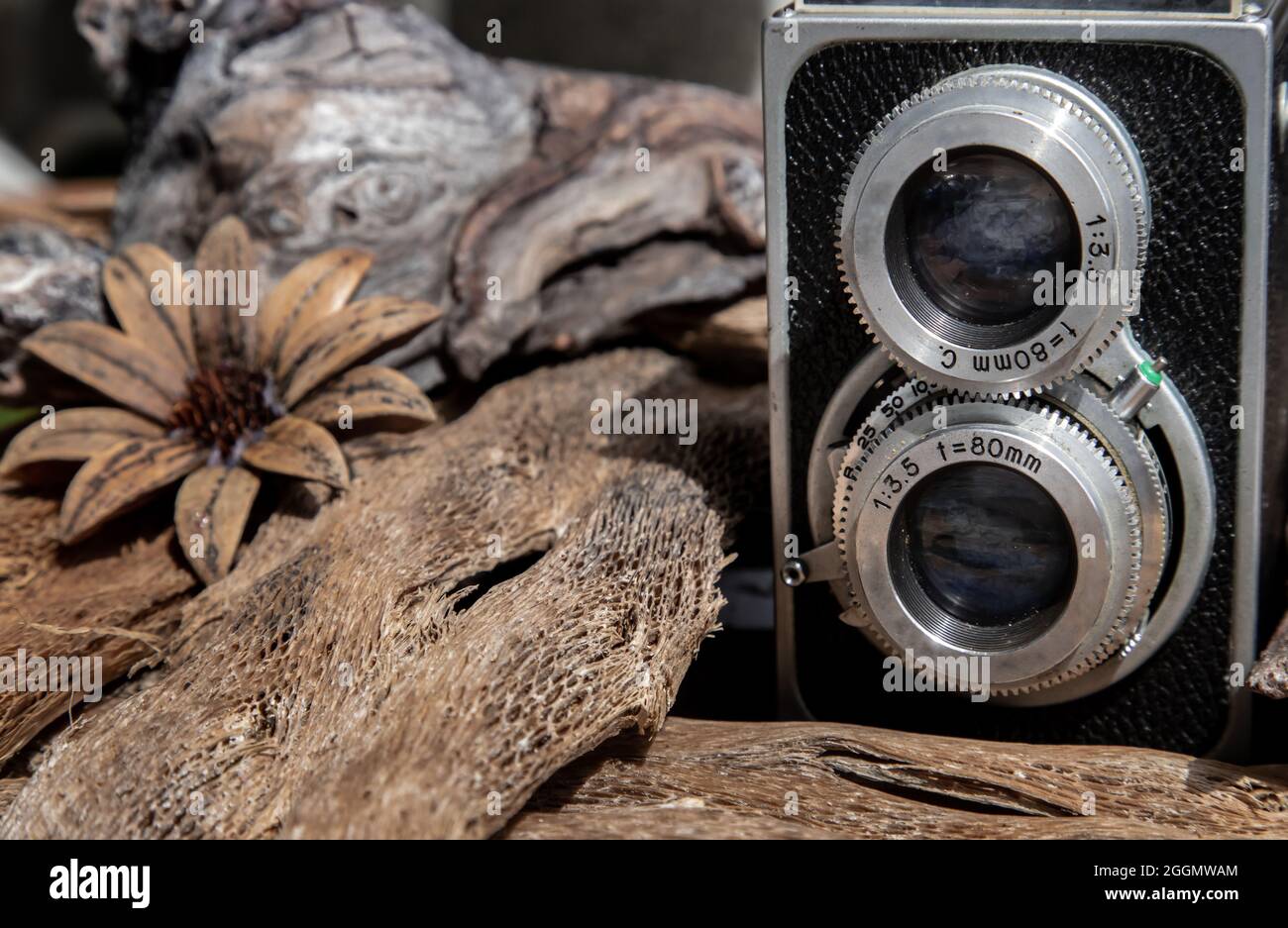 Vintage two lens photo camera on wooden background. An idea of old ...