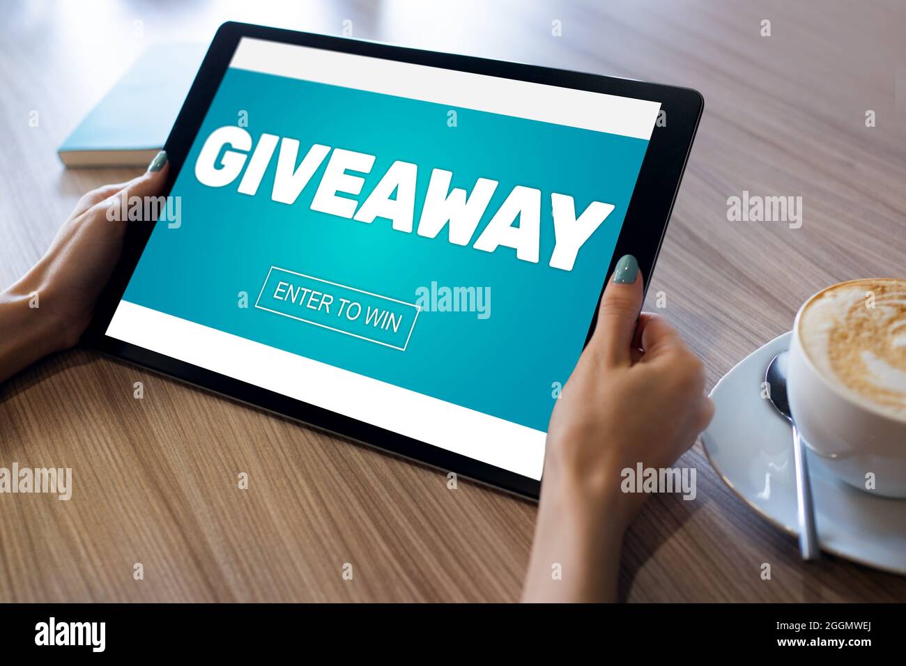 Giveaway, enter to win text on screen. Lottery and prizes. Social media ...