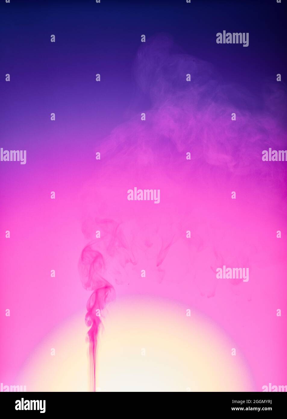 Smoke rising from diffuser with red blue purple neon gradient light ...