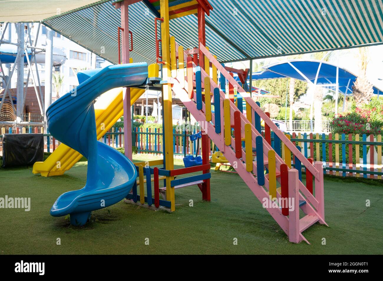 Multi-colored playground. Street slide for children Stock Photo - Alamy
