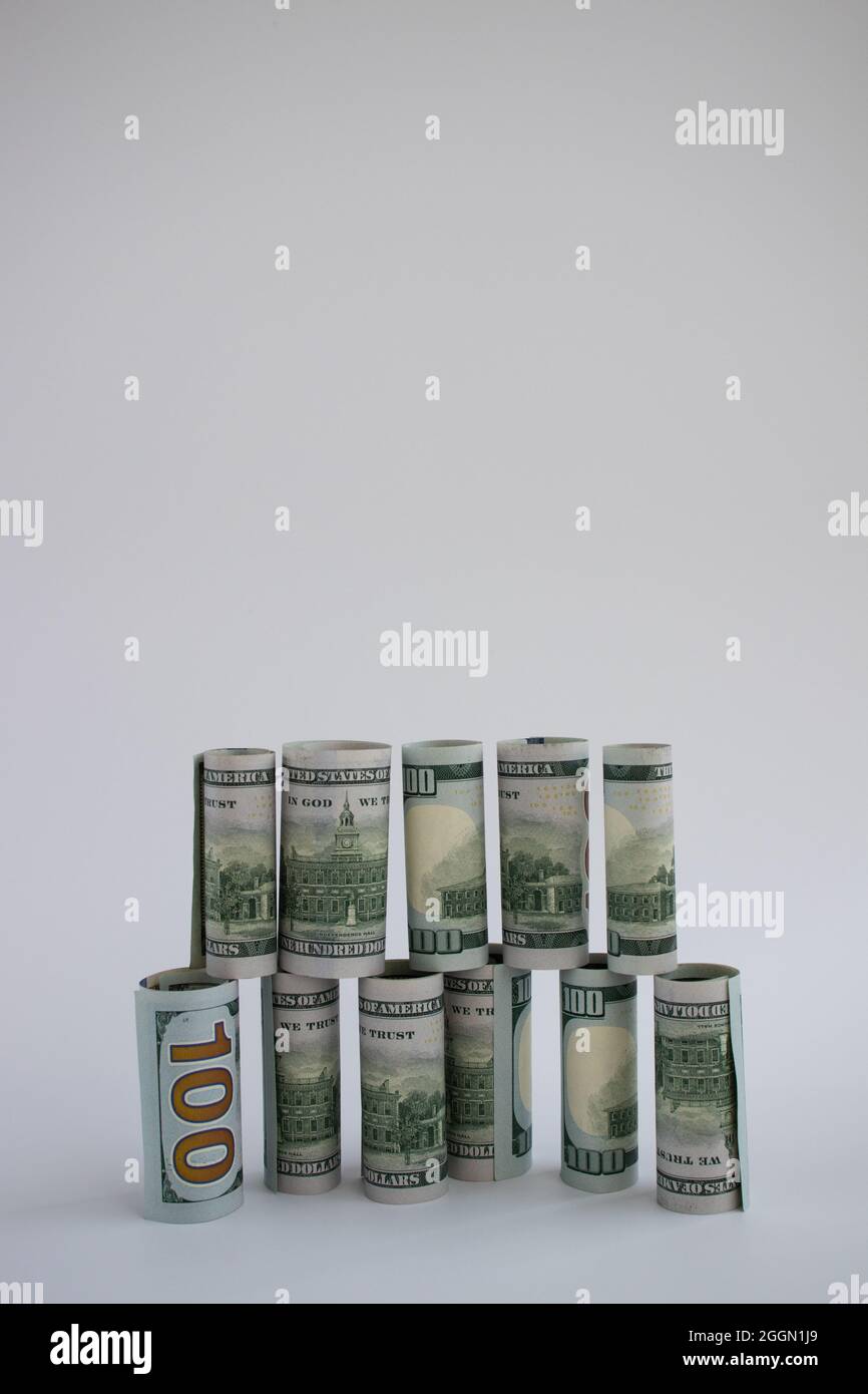 The construction from 100 dollars banknotes. Money construction Stock ...