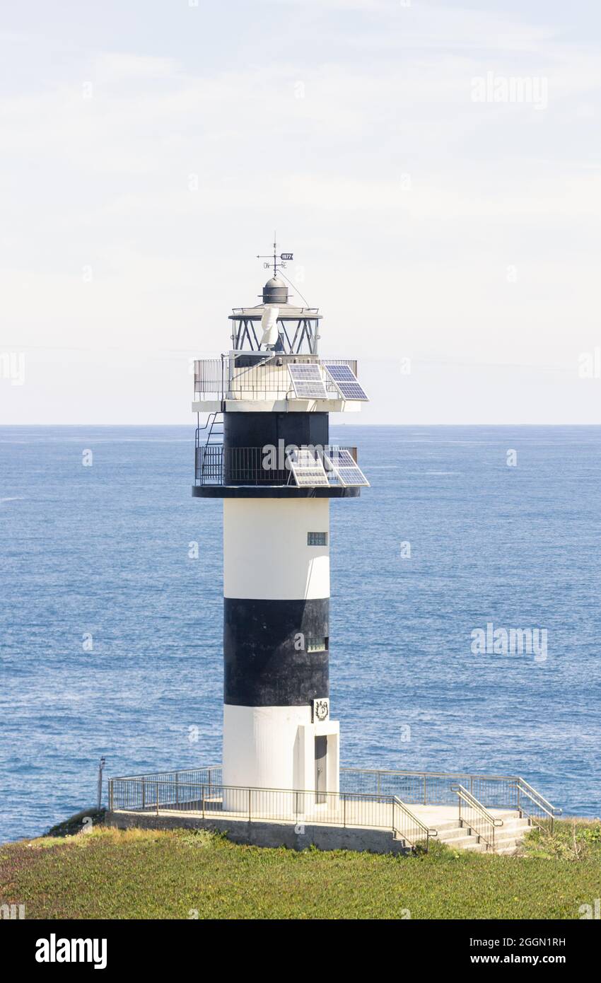 Beautiful Isla Pancha lighthouse in the town of Ribadeo, Galicia, Spain ...