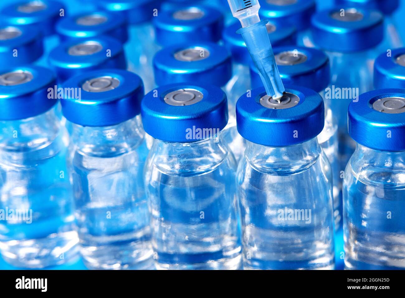 medical vials for injection. vaccine bottles with syringe Stock Photo ...