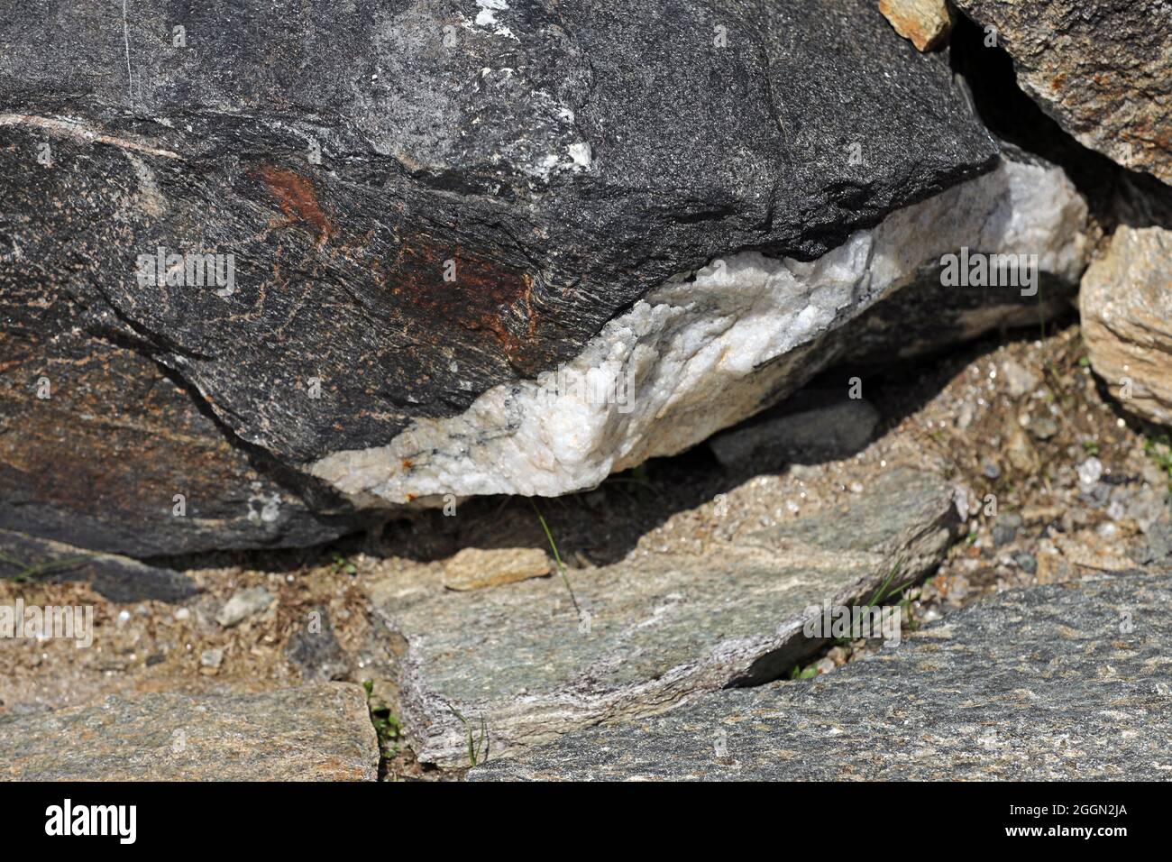 Layer of rock stones in the Alps Stock Photo - Alamy