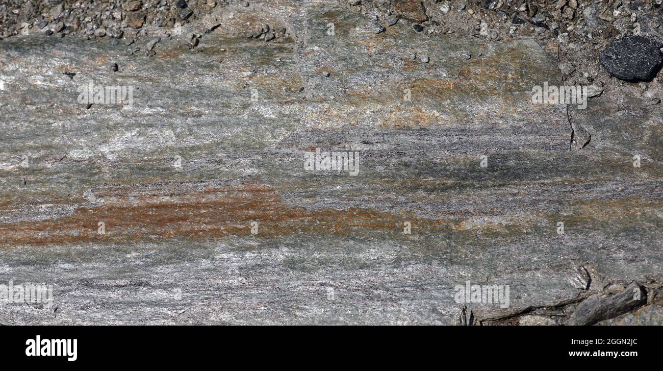 Layer of rock stones in the Alps Stock Photo - Alamy