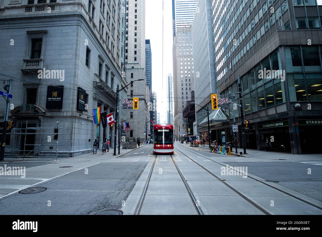 TORONTO, CANADA - Aug 11, 2021: A vanishing point shot a red tram ...