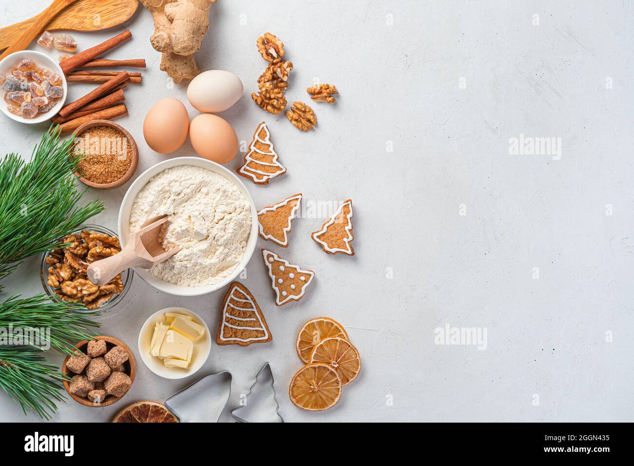 Christmas cooking background with baking ingredients and ginger cookies ...