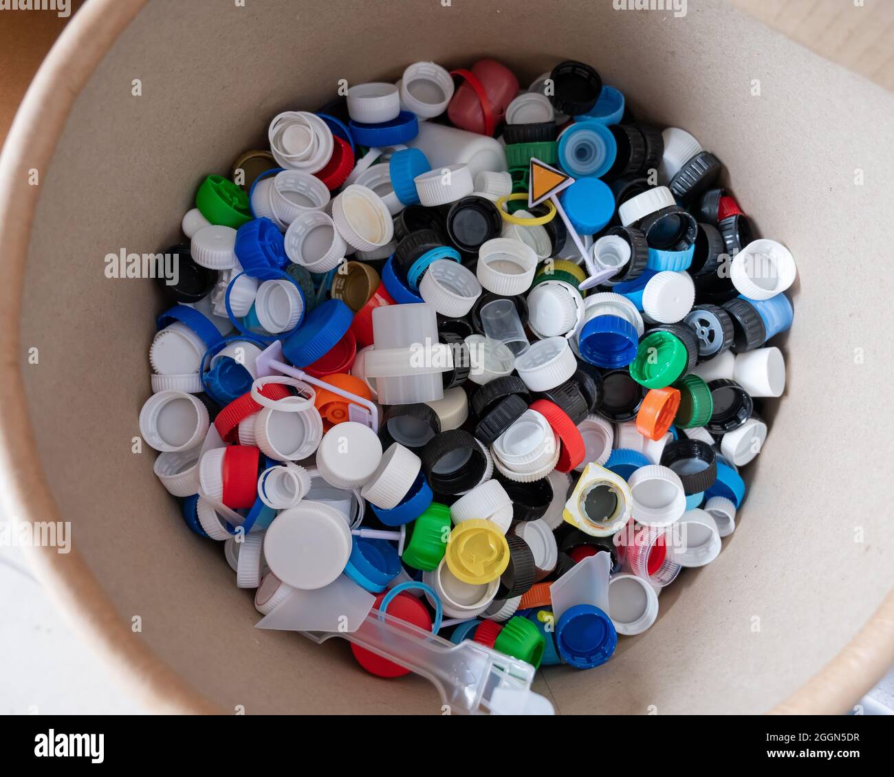 A close-up of many plastic bottle caps collected for recycling Stock ...
