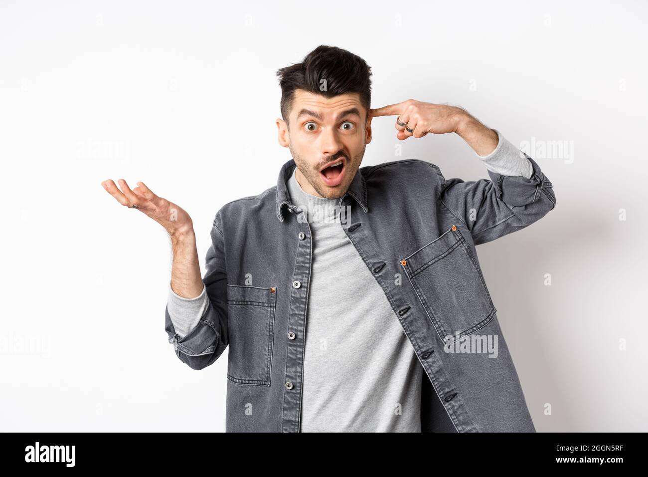 Are you crazy. Angry man scolding person for stupid actions, pointing ...