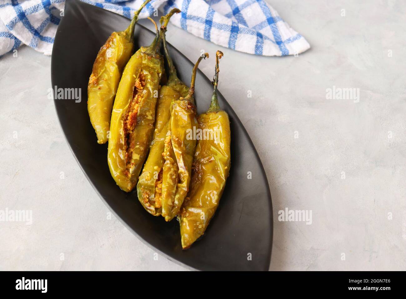 Stuffed Green Chillies fry, Bharwa Masala Mirch or Bharli Mirchi ...