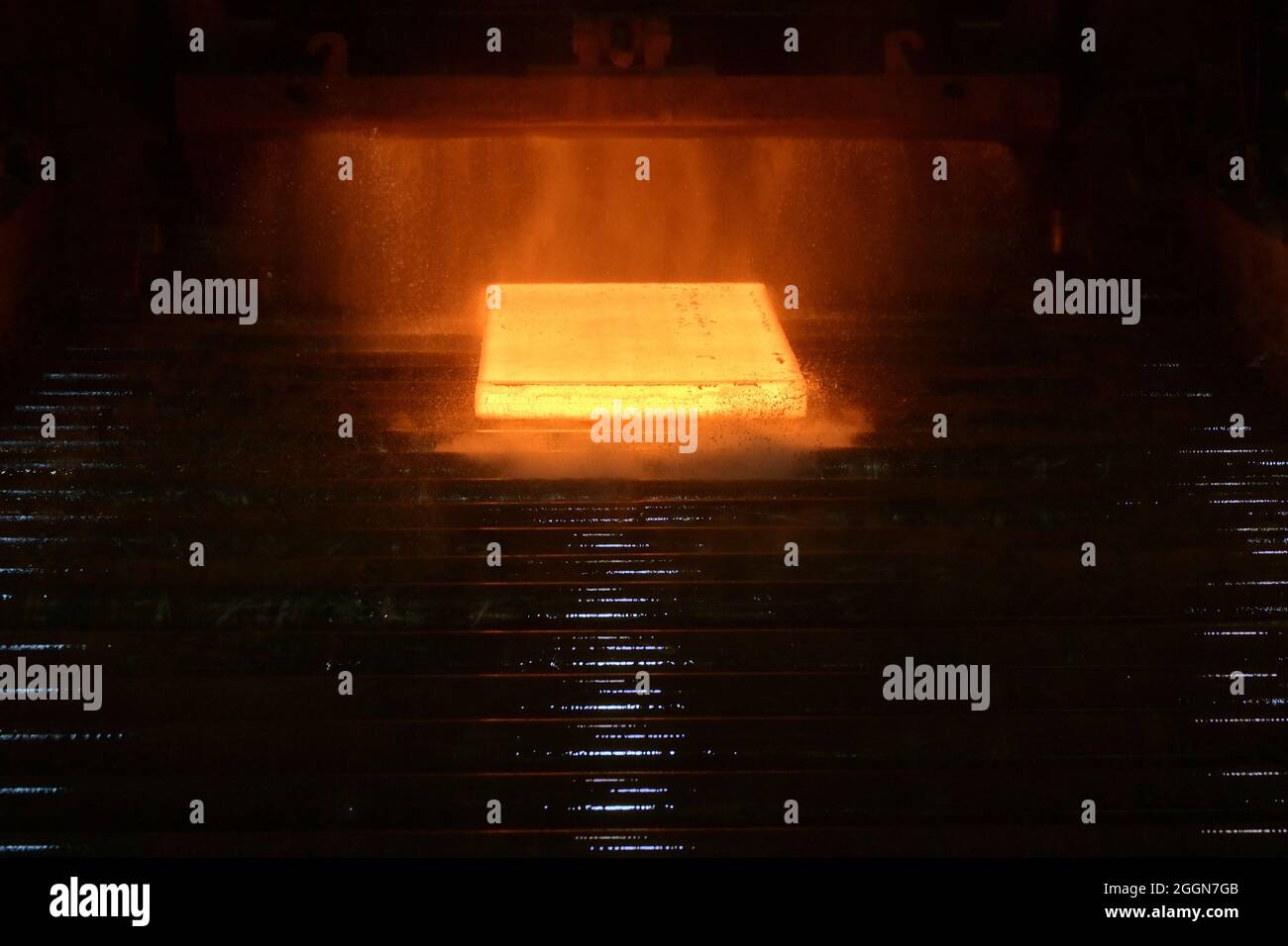 hot steel plate on conveyor in steel plant Stock Photo - Alamy