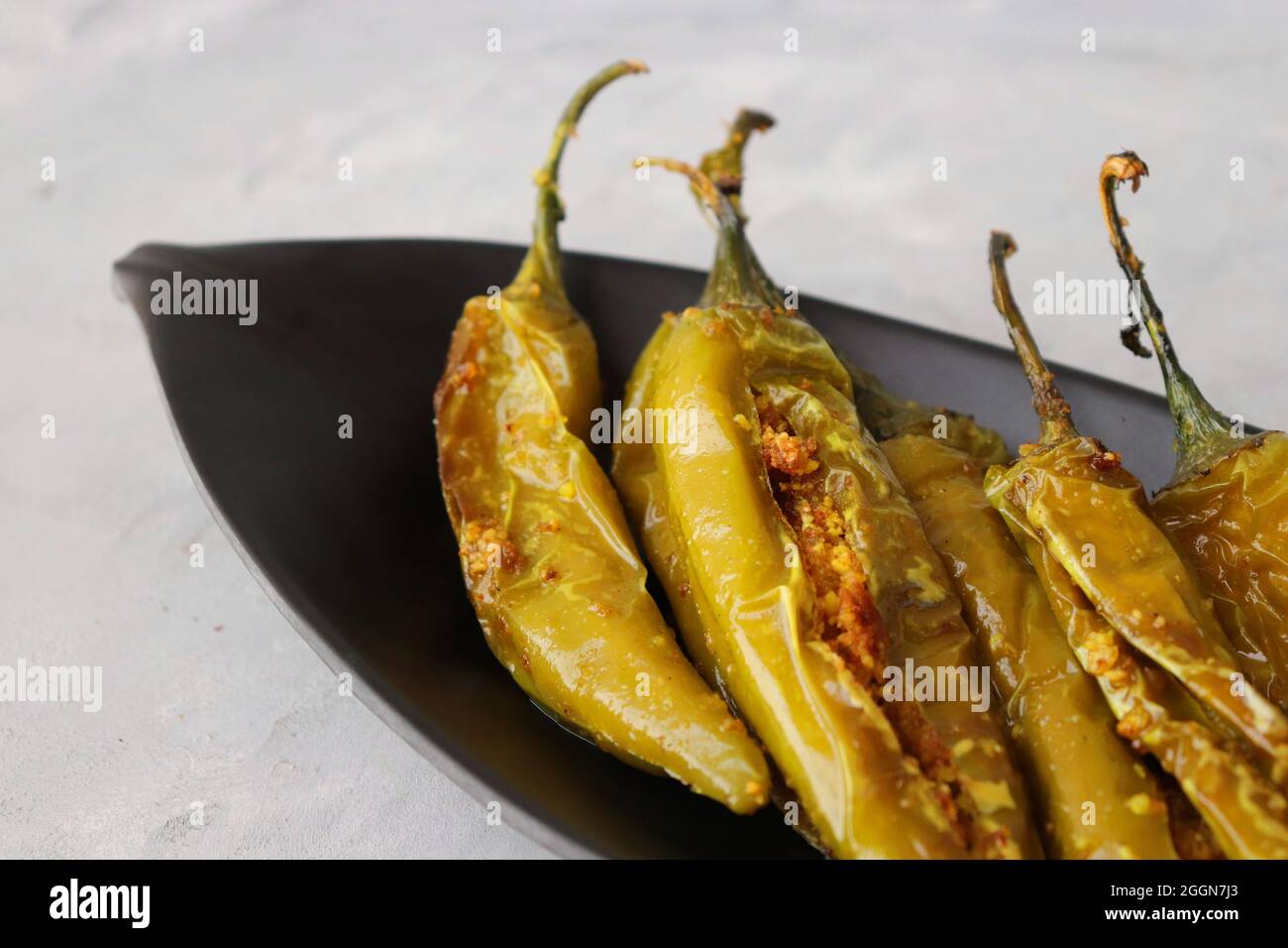 Stuffed Green Chillies fry, Bharwa Masala Mirch or Bharli Mirchi ...