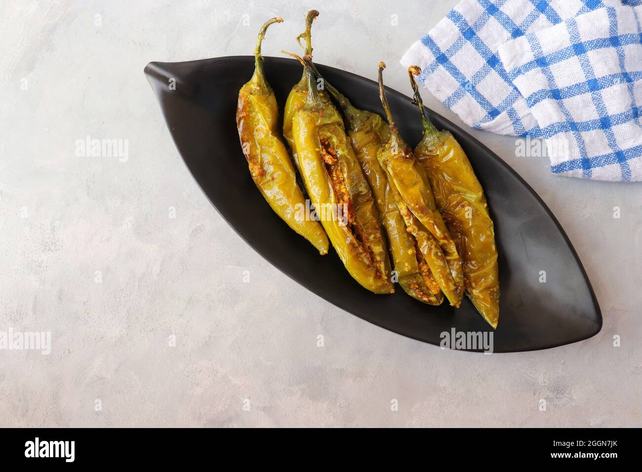 Stuffed Green Chillies fry, Bharwa Masala Mirch or Bharli Mirchi ...