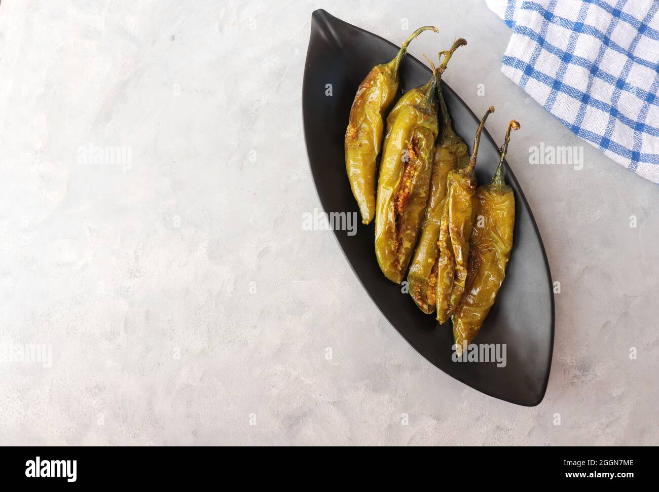 Stuffed Green Chillies fry, Bharwa Masala Mirch or Bharli Mirchi ...