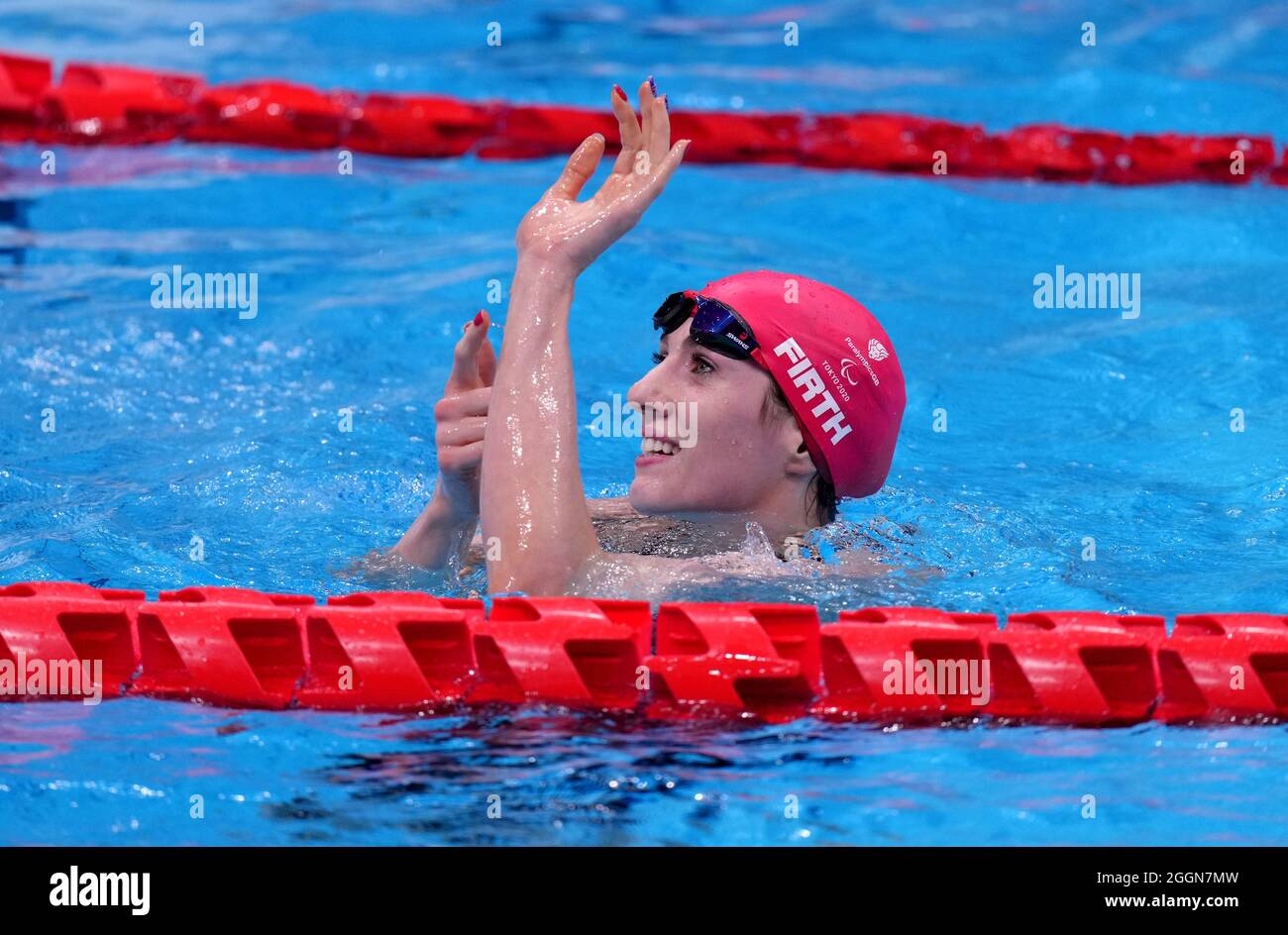 Great Britain's Bethany Firth celebrates winning gold in the Women's ...