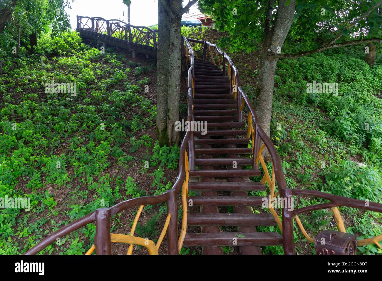 Wooden steps up steep hill hi-res stock photography and images - Alamy