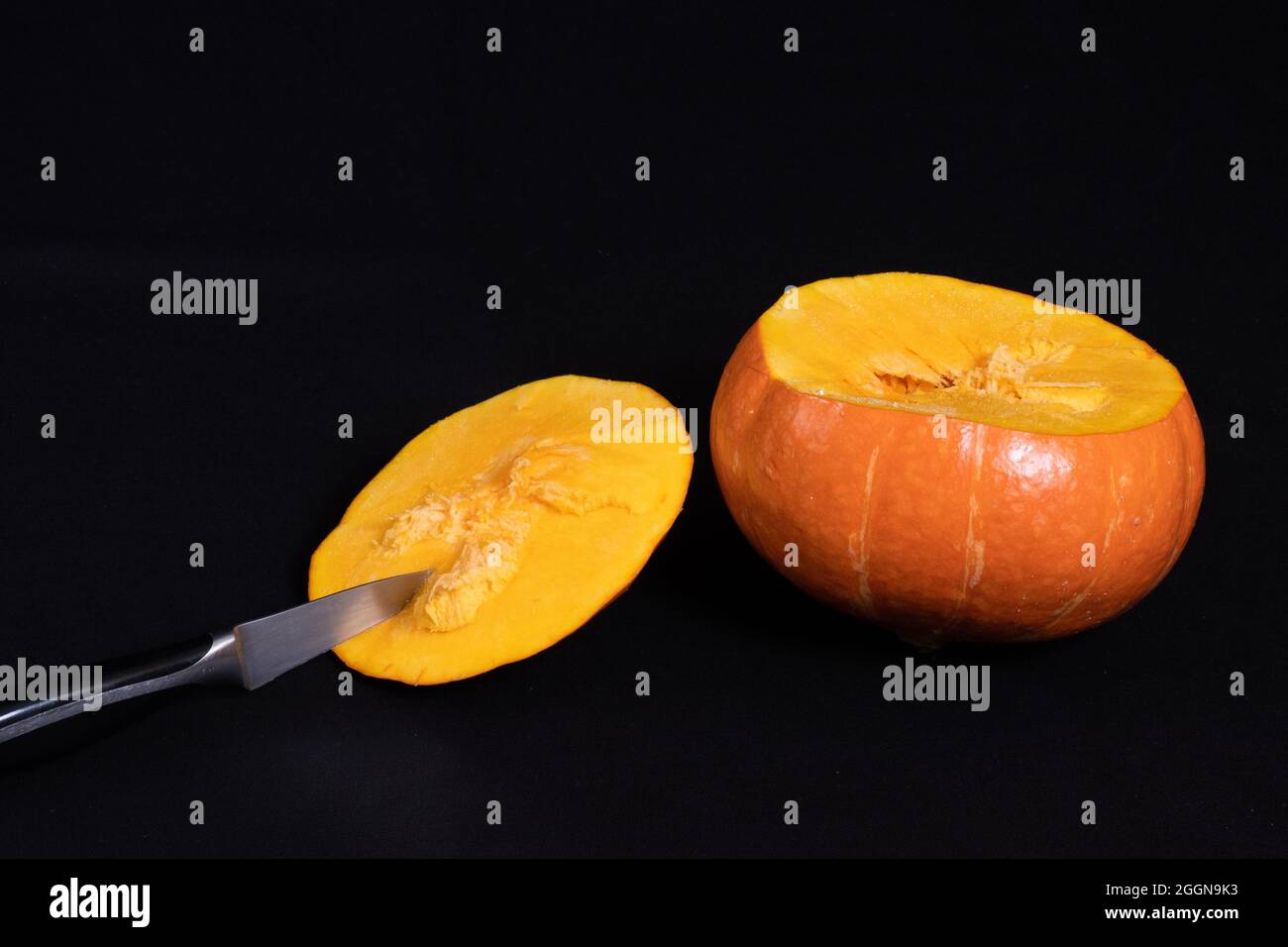 Step 1 cut off the top of the pumpkin. Knife and pumpkin cut into 2 ...