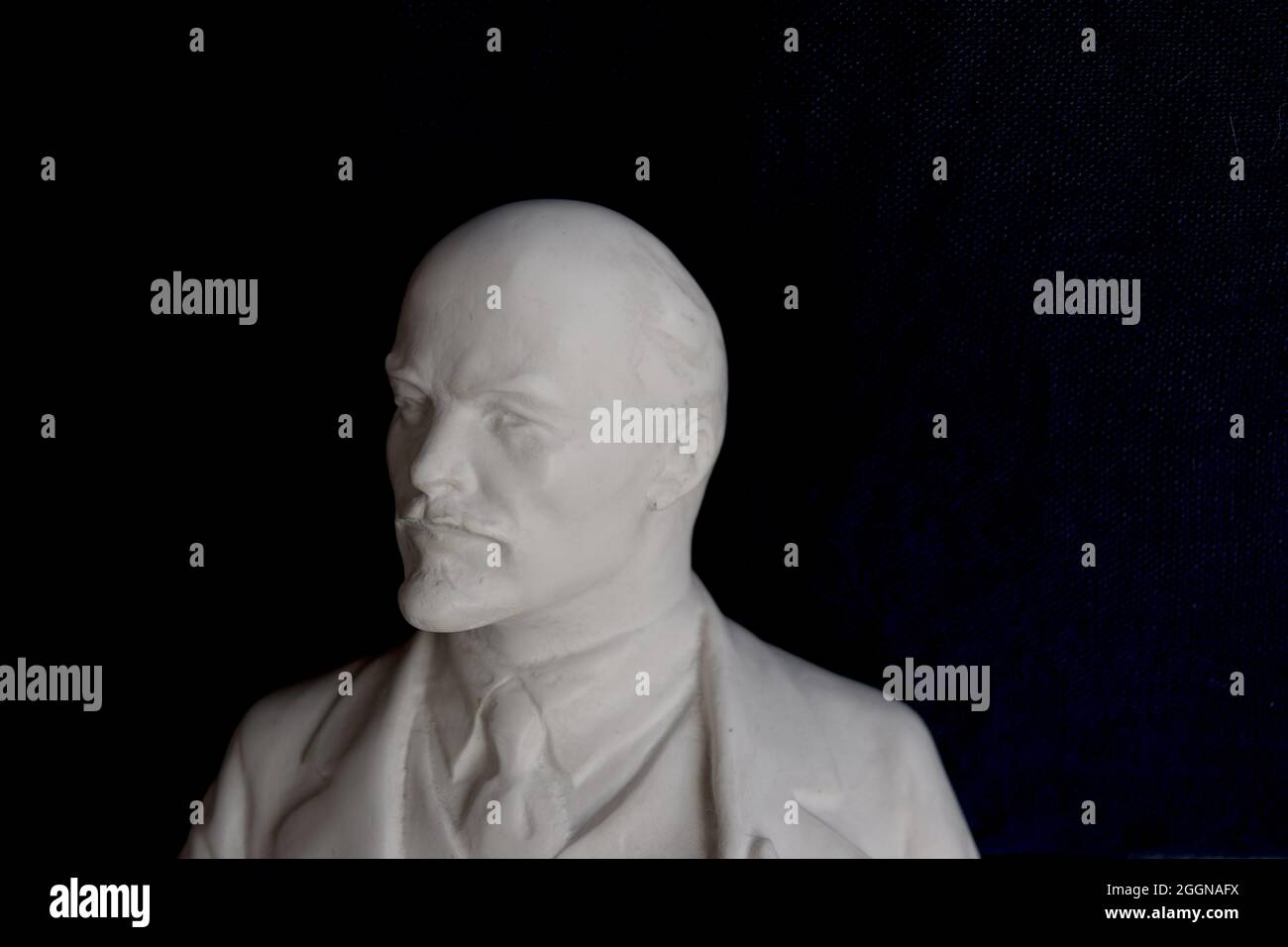 Lenin sculpture on dark background Stock Photo - Alamy