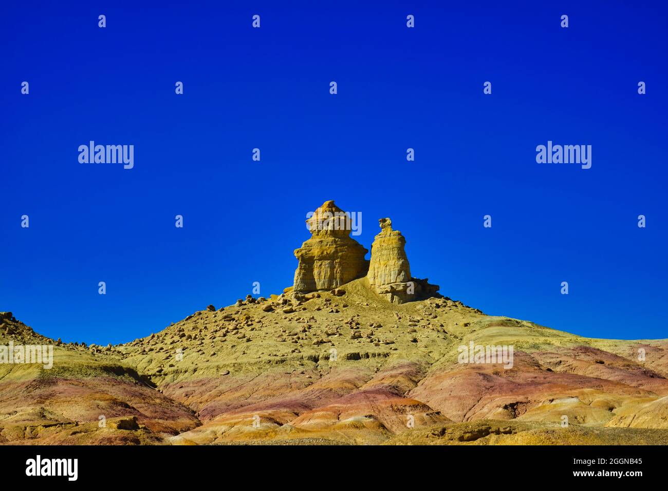 Wind eroded square hills, minarets, peaks, Efege mounds. Clean blue sky ...