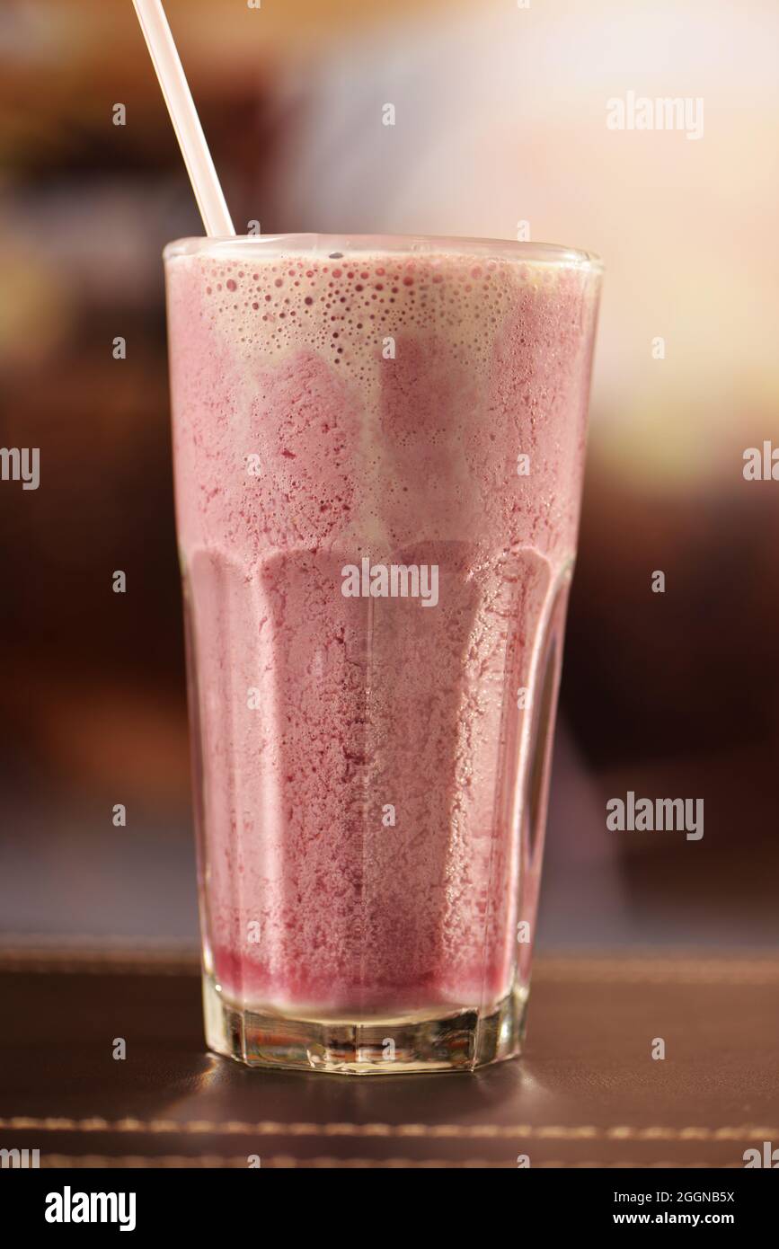 milk beaten with red fruits Stock Photo - Alamy