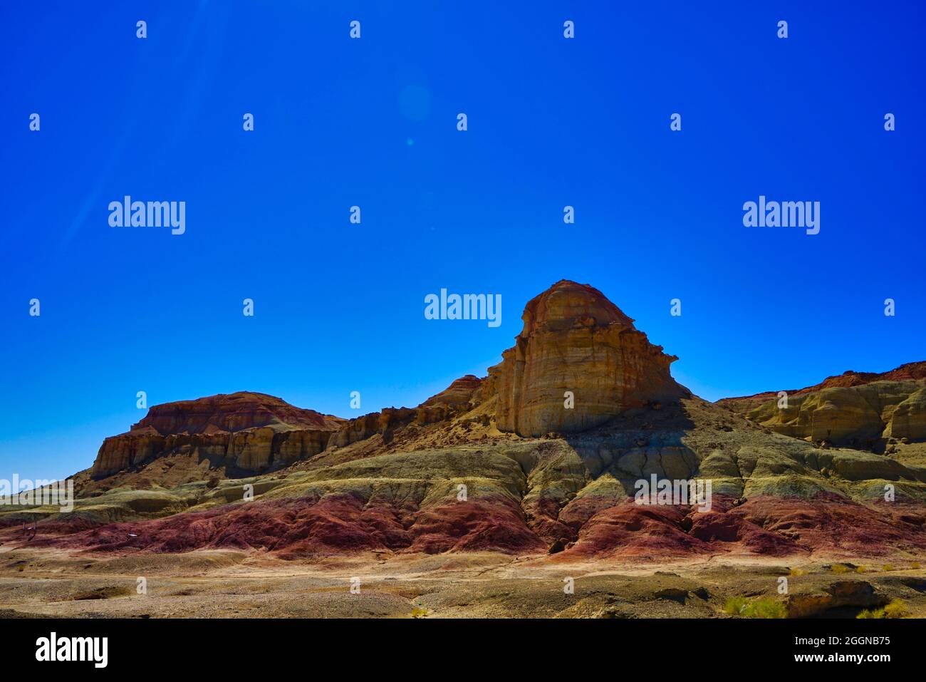Wind eroded square hills, minarets, peaks, Efege mounds. Clean blue sky ...