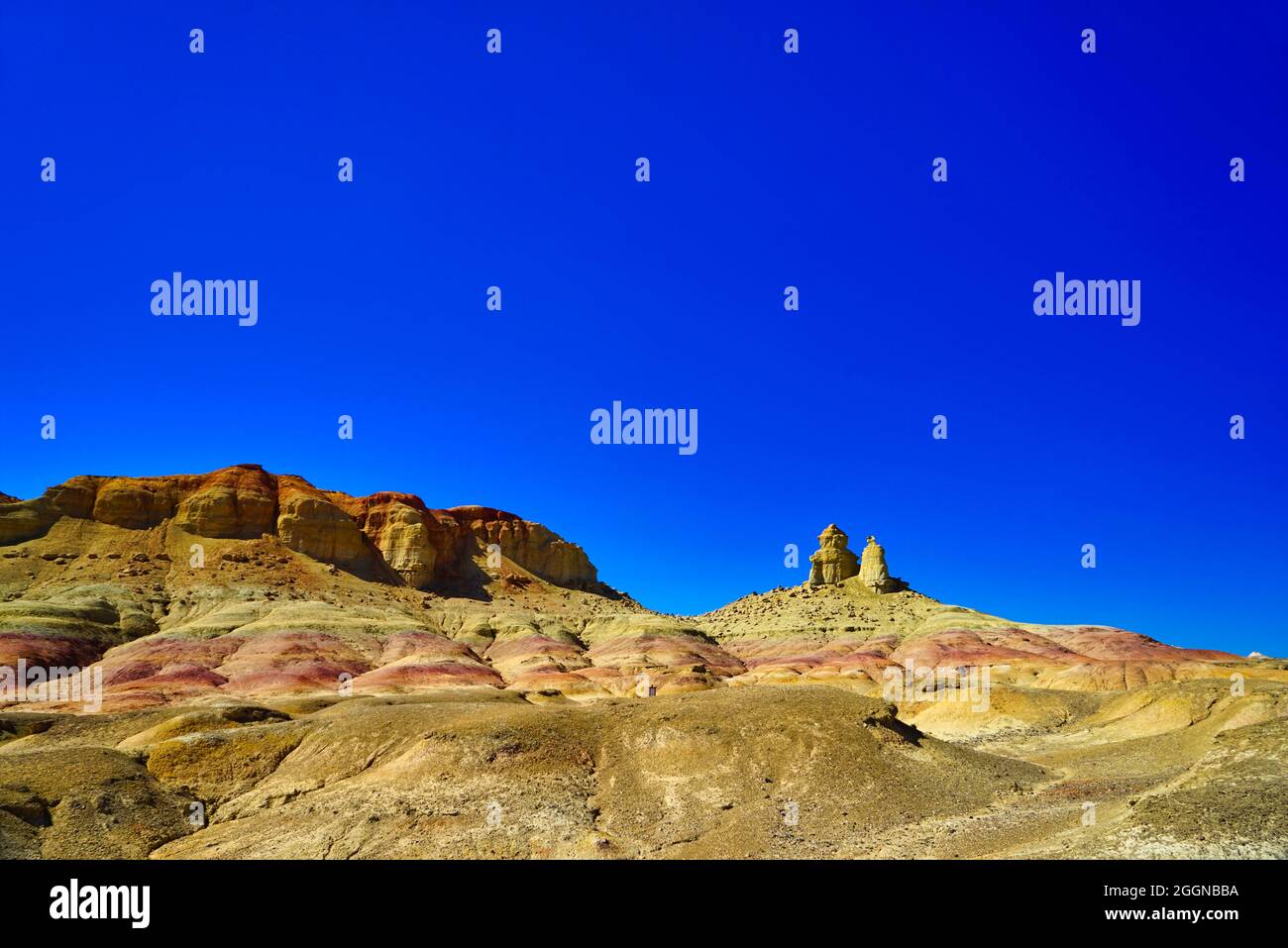 Wind eroded square hills, minarets, peaks, Efege mounds. Clean blue sky ...