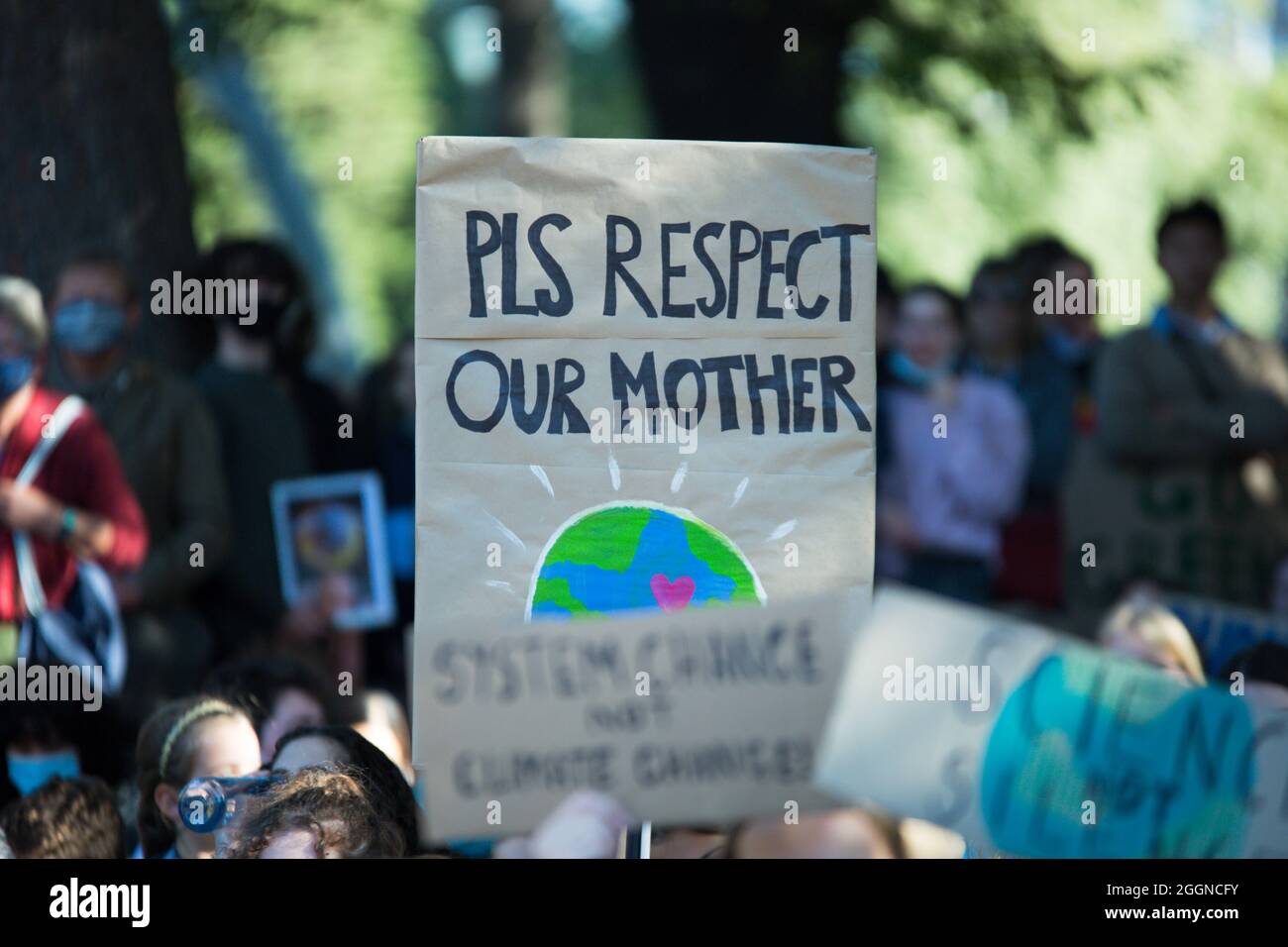 MELBOURNE, AUSTRALIA - May 21, 2021: Climate Change protester holds ...