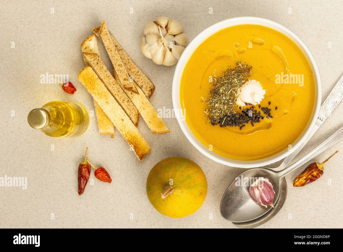 Pumpkin cream soup. Traditional autumn food. Hot dish, ripe vegetables ...