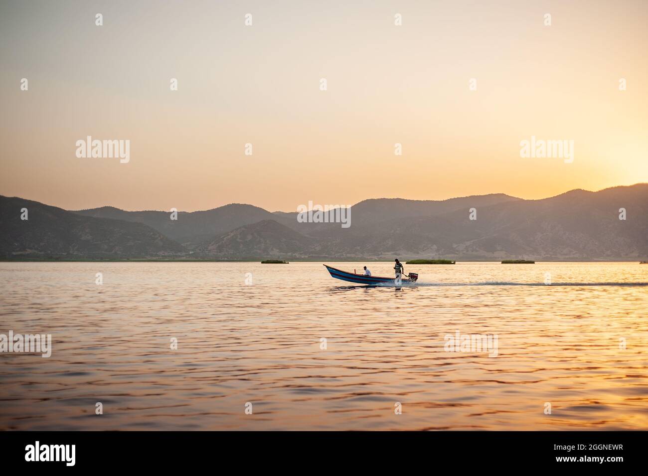 Man riding boat hi-res stock photography and images - Alamy