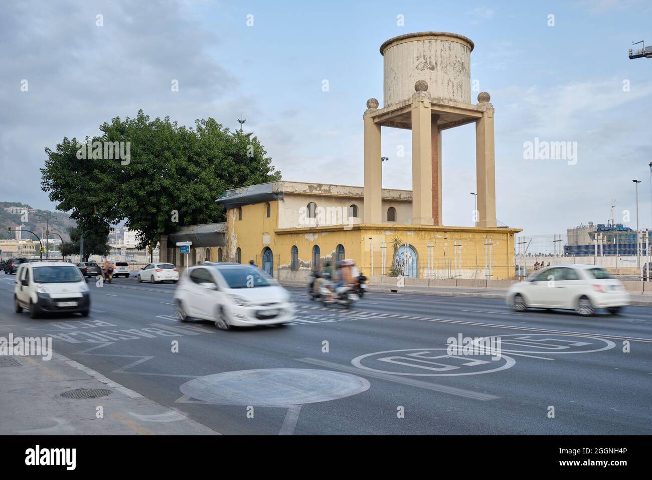 Water tank and Endesa building, port of Malaga, Spain Stock Photo - Alamy