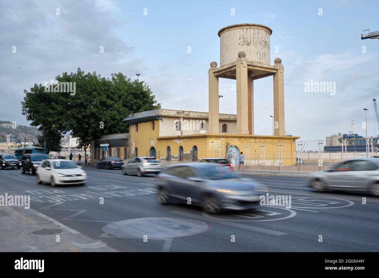 Water tank and Endesa building, port of Malaga, Spain Stock Photo - Alamy