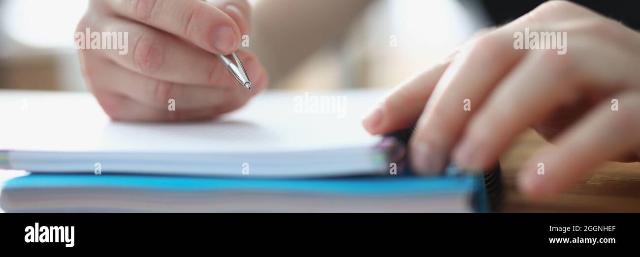 Male hand writing with ballpoint pen in notebook closeup Stock Photo ...