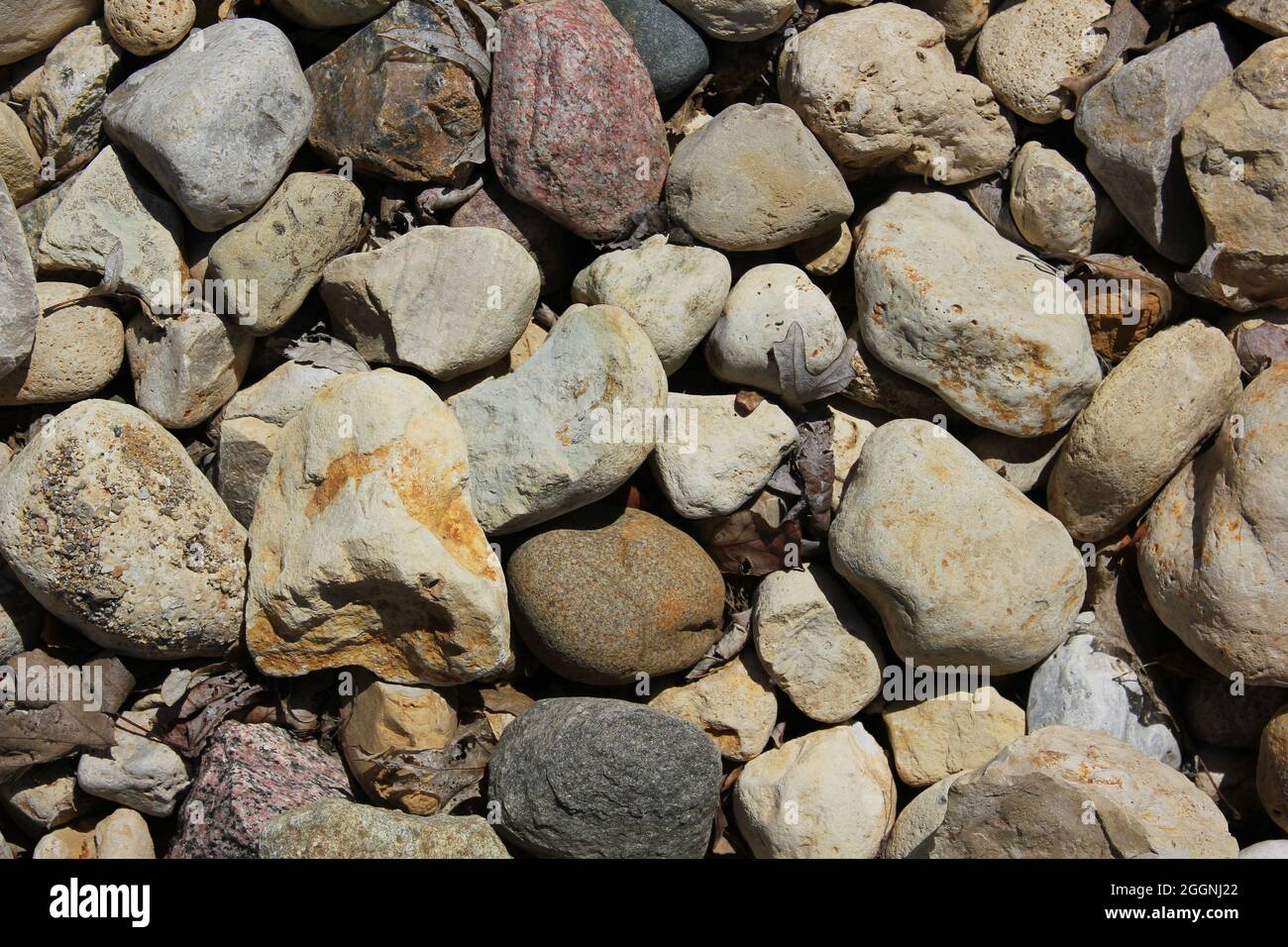 Full frame of natural rocks laying in the bright summer sun Stock Photo ...