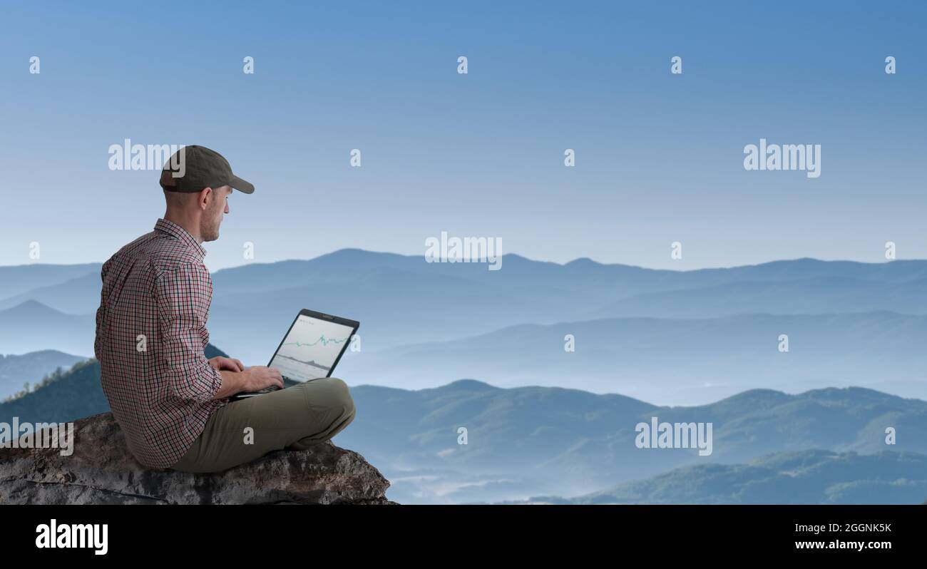 Working remotely outdoors hi-res stock photography and images - Alamy