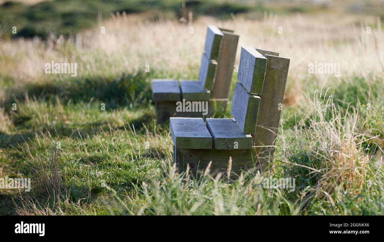 Wooden bench in the countryside Stock Photo - Alamy