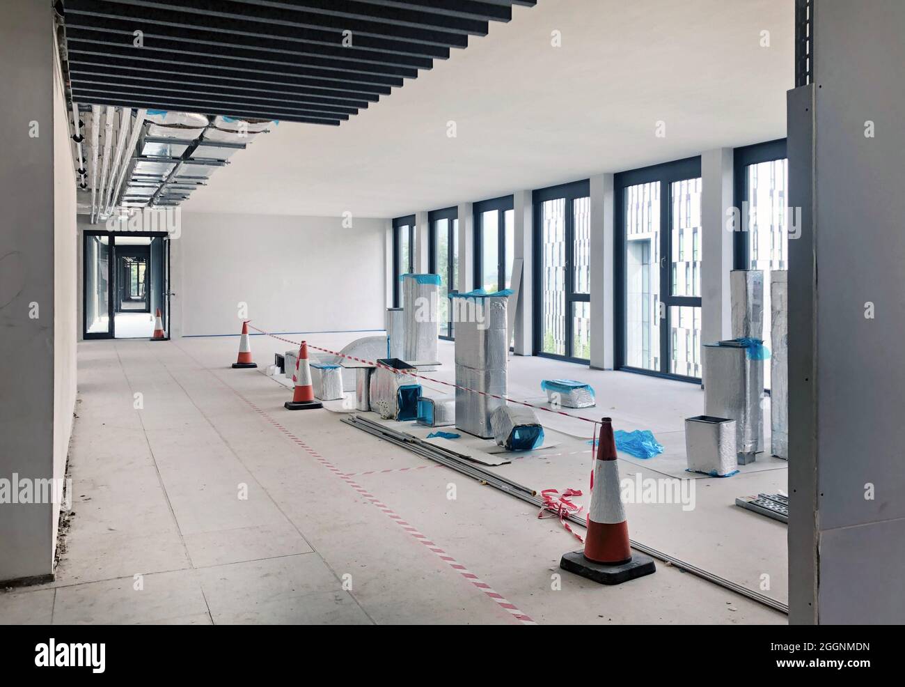 Empty corridor of a building under construction Stock Photo - Alamy