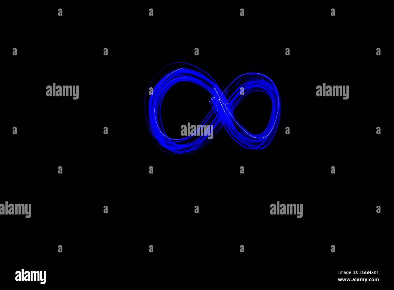Light painting infinity sign. Drawn infinity shape with blue lights ...