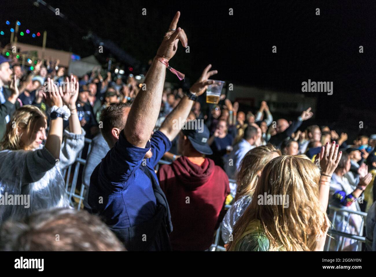 BORNHOLM, DENMARK - Aug 07, 2021: A large crowd gathered to a concert ...