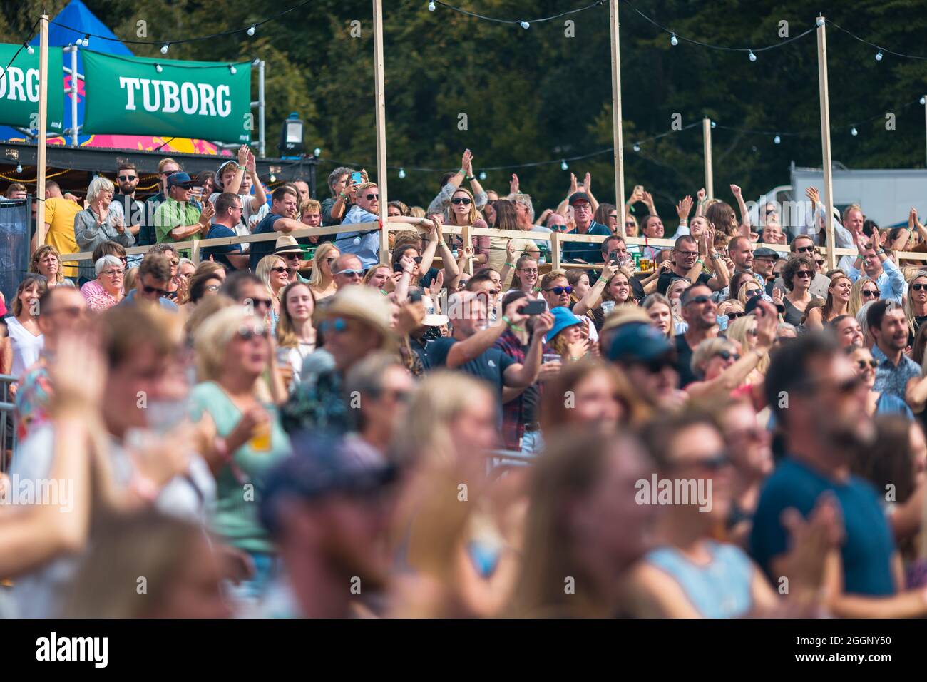 BORNHOLM, DENMARK - Aug 07, 2021: A large crowd gathered to a concert ...