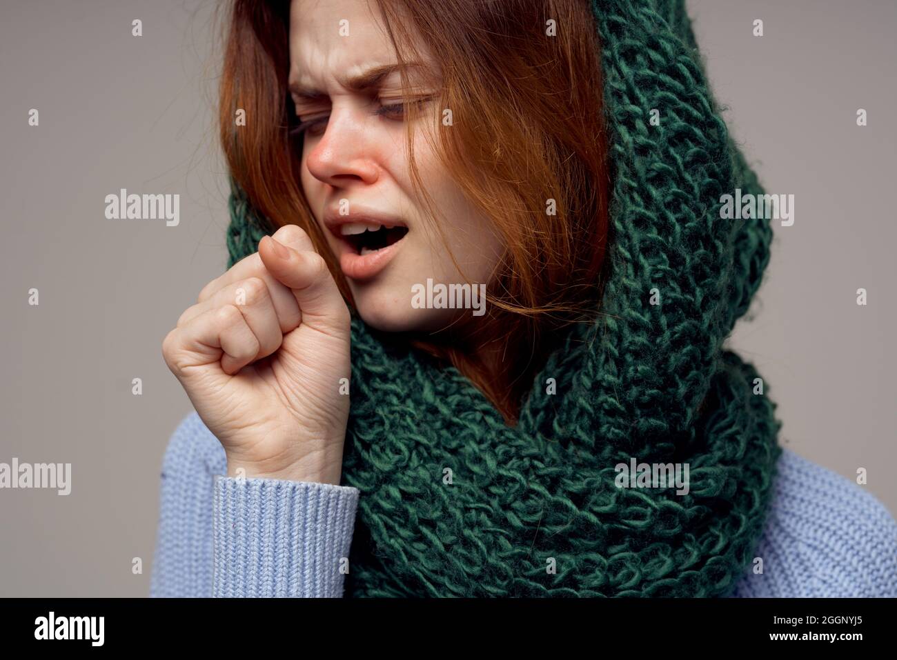 woman health problems temperature light background Stock Photo - Alamy