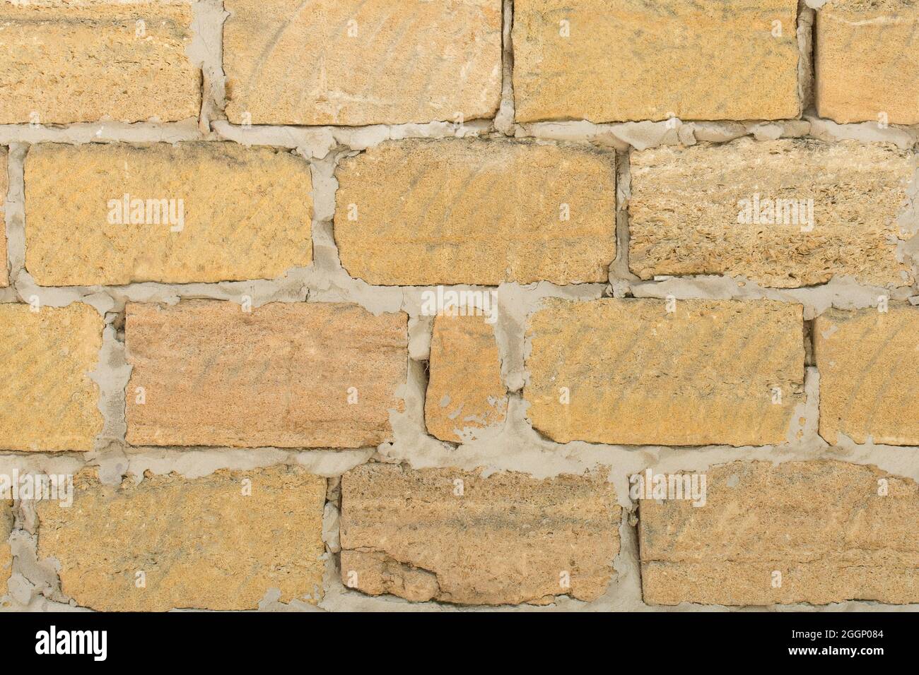 Shell sand and clay brick wall texture background Stock Photo - Alamy