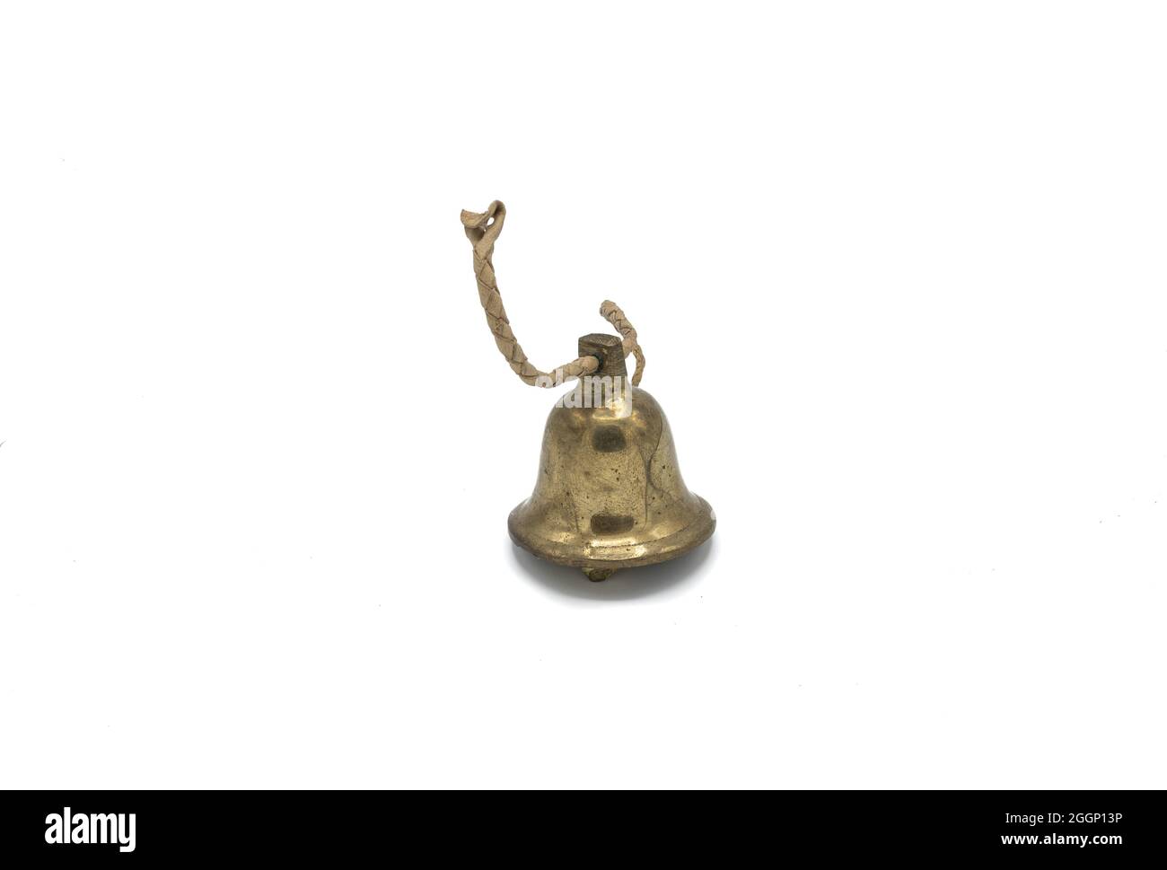 Old gold bell isolated on a white background Stock Photo - Alamy