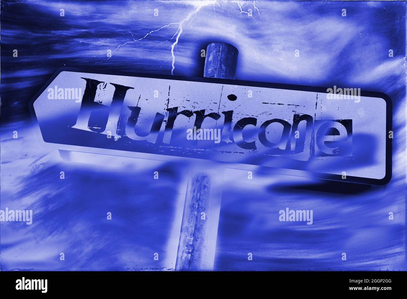 Hurricane, written on a street sign with post, Storm and lightning in ...