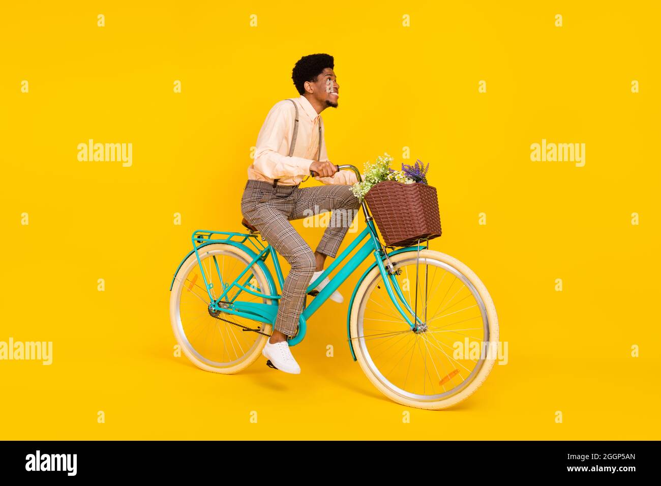 Profile photo of cheerful african guy ride bicycle toothy smile wear ...